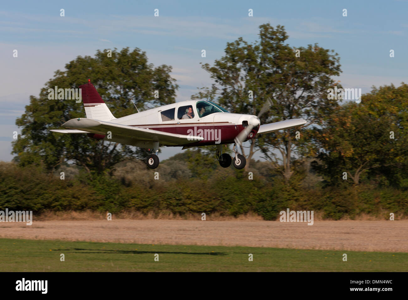 Piper PA-28-140 Cherokee G-ATVO landing at Breighton Airfield Stock ...