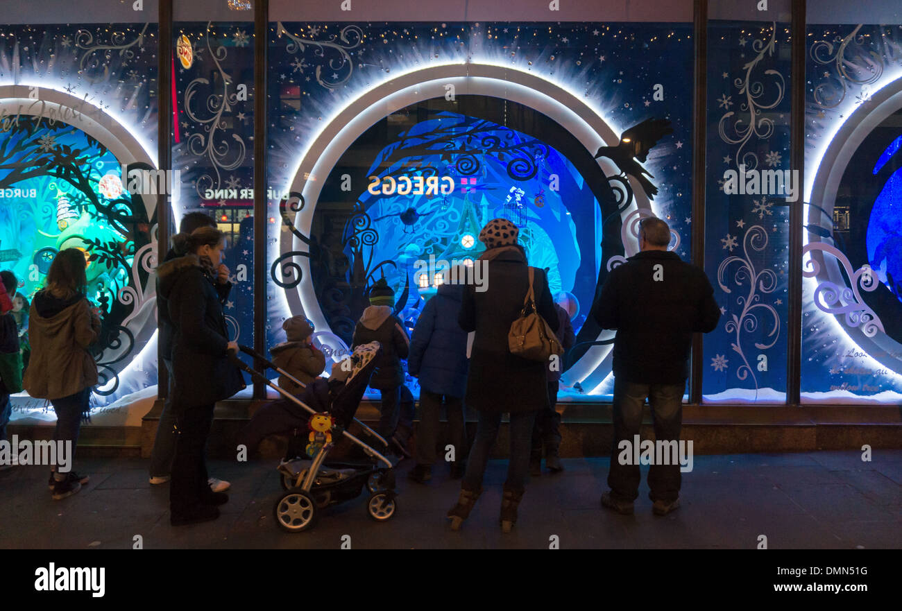 Families looking into Fenwick's shop window, Christmas display ...