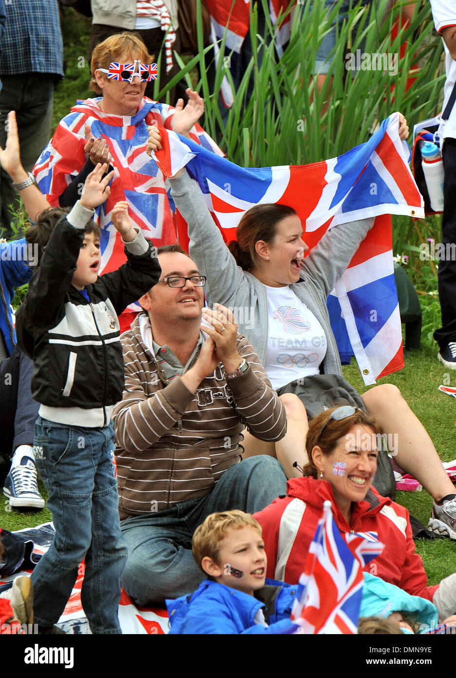 A large group of fans celebrate first Gold Medal won by team GB Rowers ...