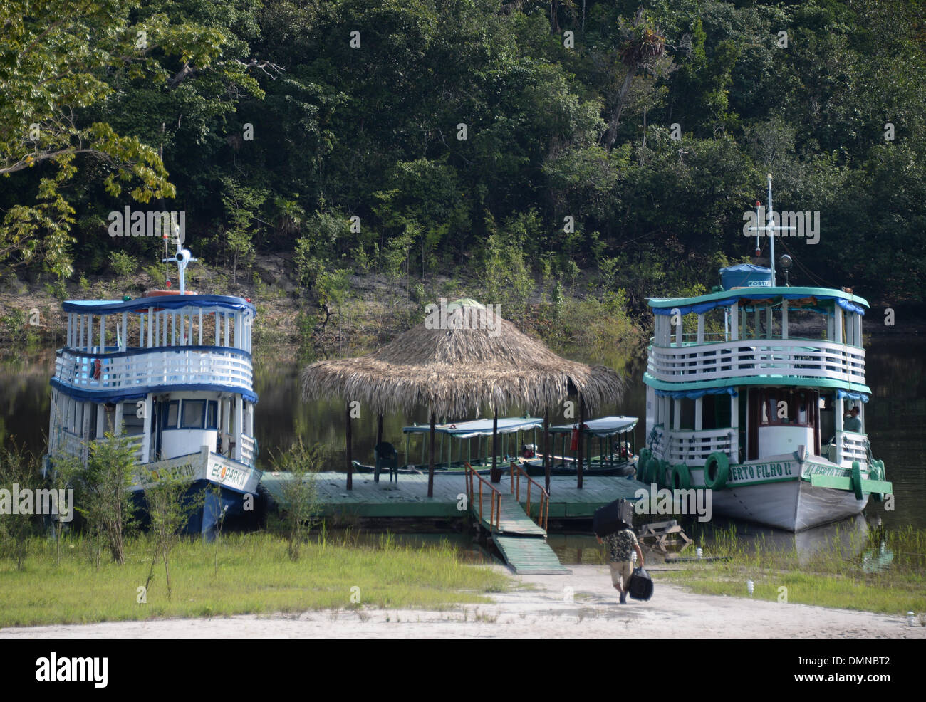 Manaus, Brazil. 12th Dec, 2013. Passengers board a typical Amazon ferry ...