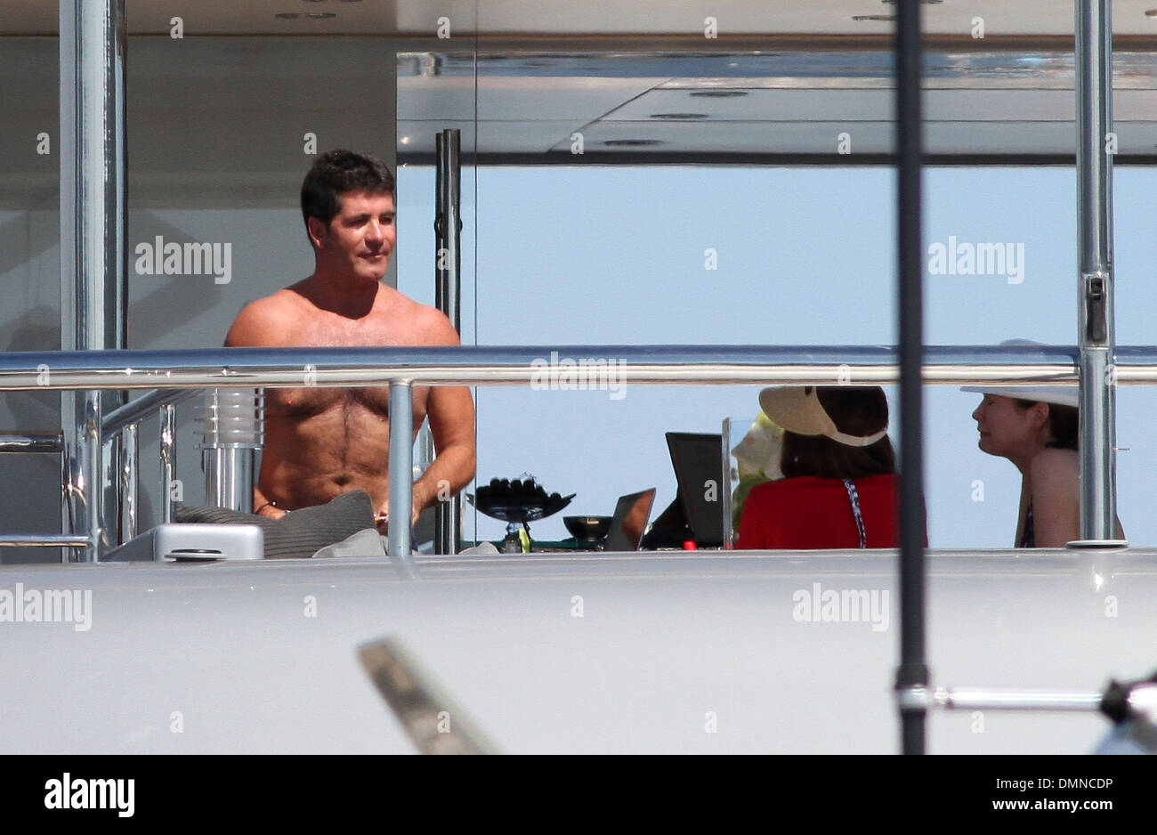 Simon Cowell spends time onboard a luxury yacht during a holiday in St ...