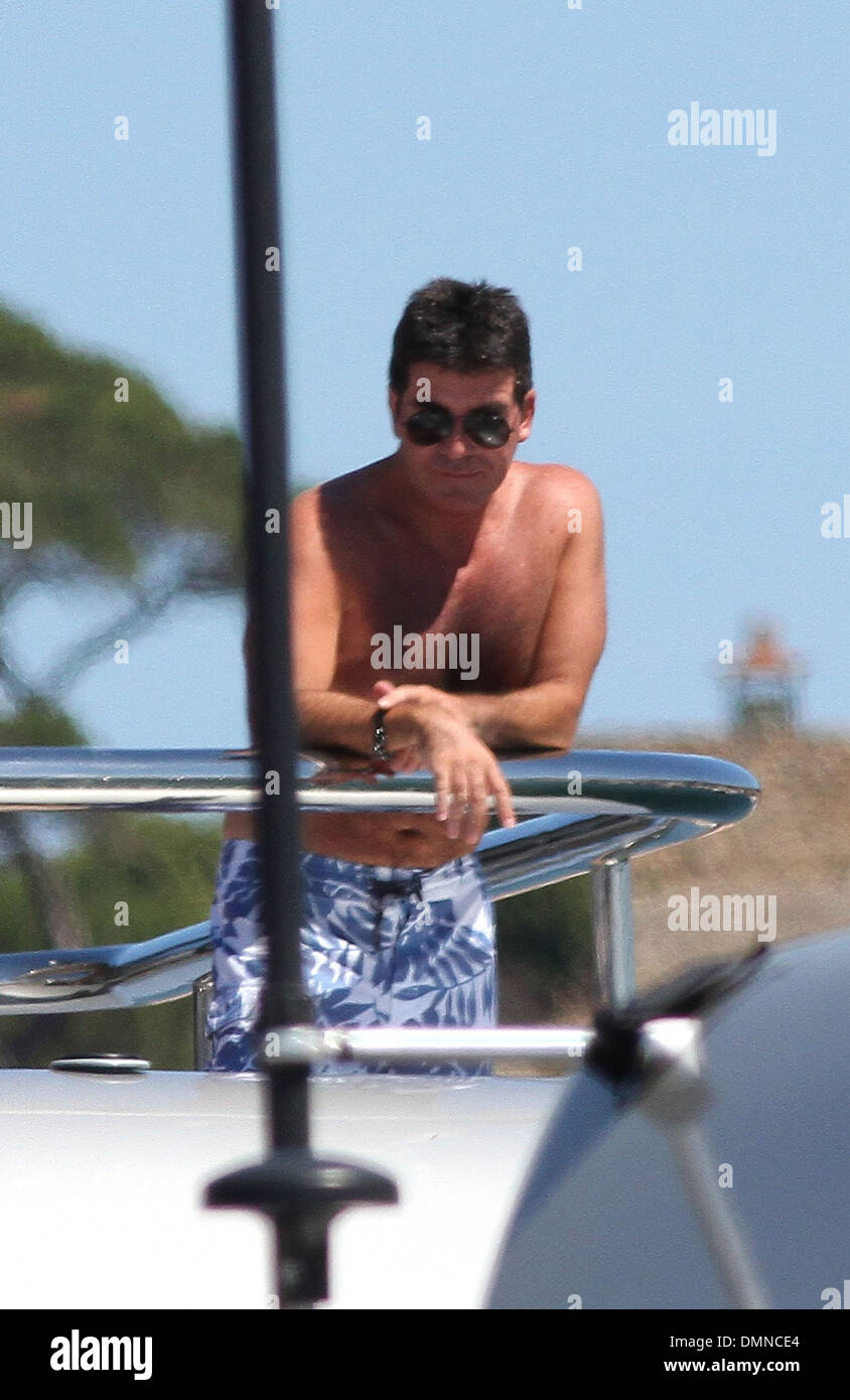 Simon Cowell spends time onboard a luxury yacht during a holiday in St ...