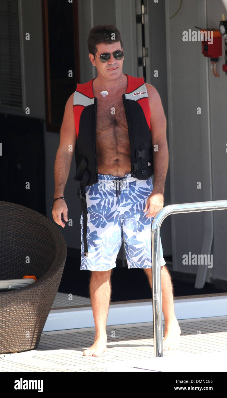 Simon Cowell gets ready a jet ski ride during a holiday in St Tropez St ...