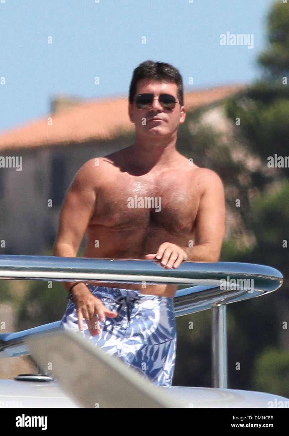 Simon Cowell spends time onboard a luxury yacht during a holiday in St ...