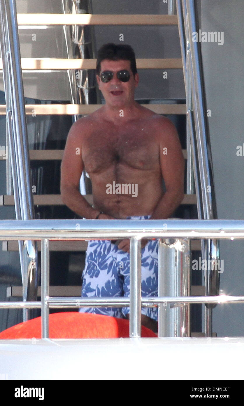 Simon Cowell spends time onboard a luxury yacht during a holiday in St ...
