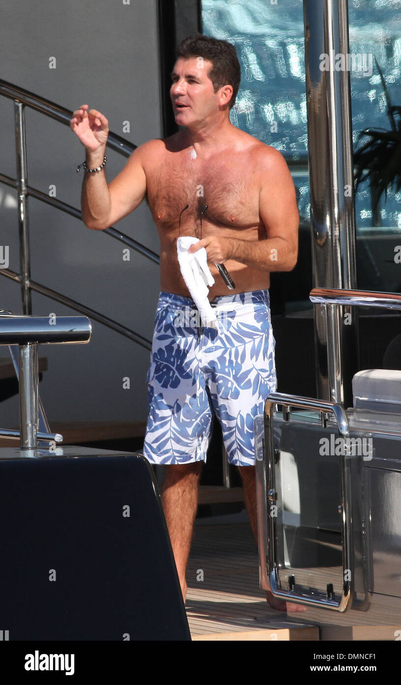 Simon Cowell spends time onboard a luxury yacht during a holiday in St ...