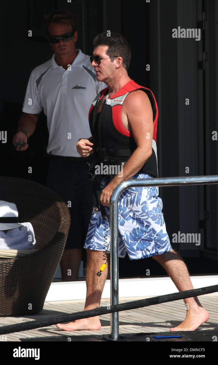 Simon Cowell gets ready a jet ski ride during a holiday in St Tropez St ...
