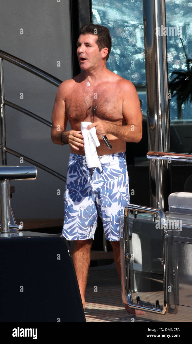Simon Cowell spends time onboard a luxury yacht during a holiday in St ...