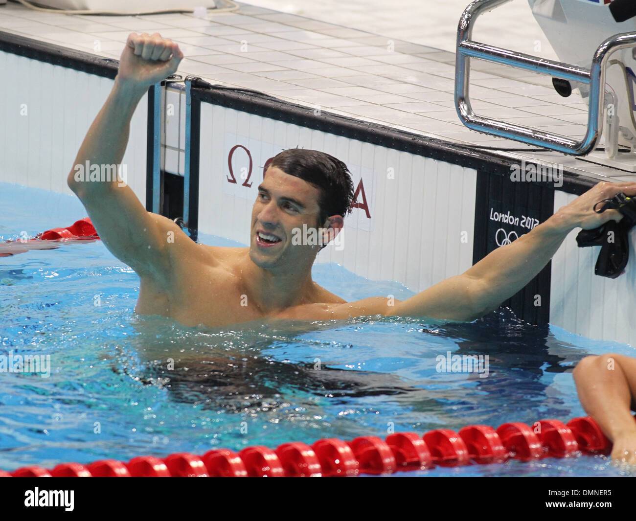Michael Phelps wins gold in men's 100-meter butterfly swimming final at ...