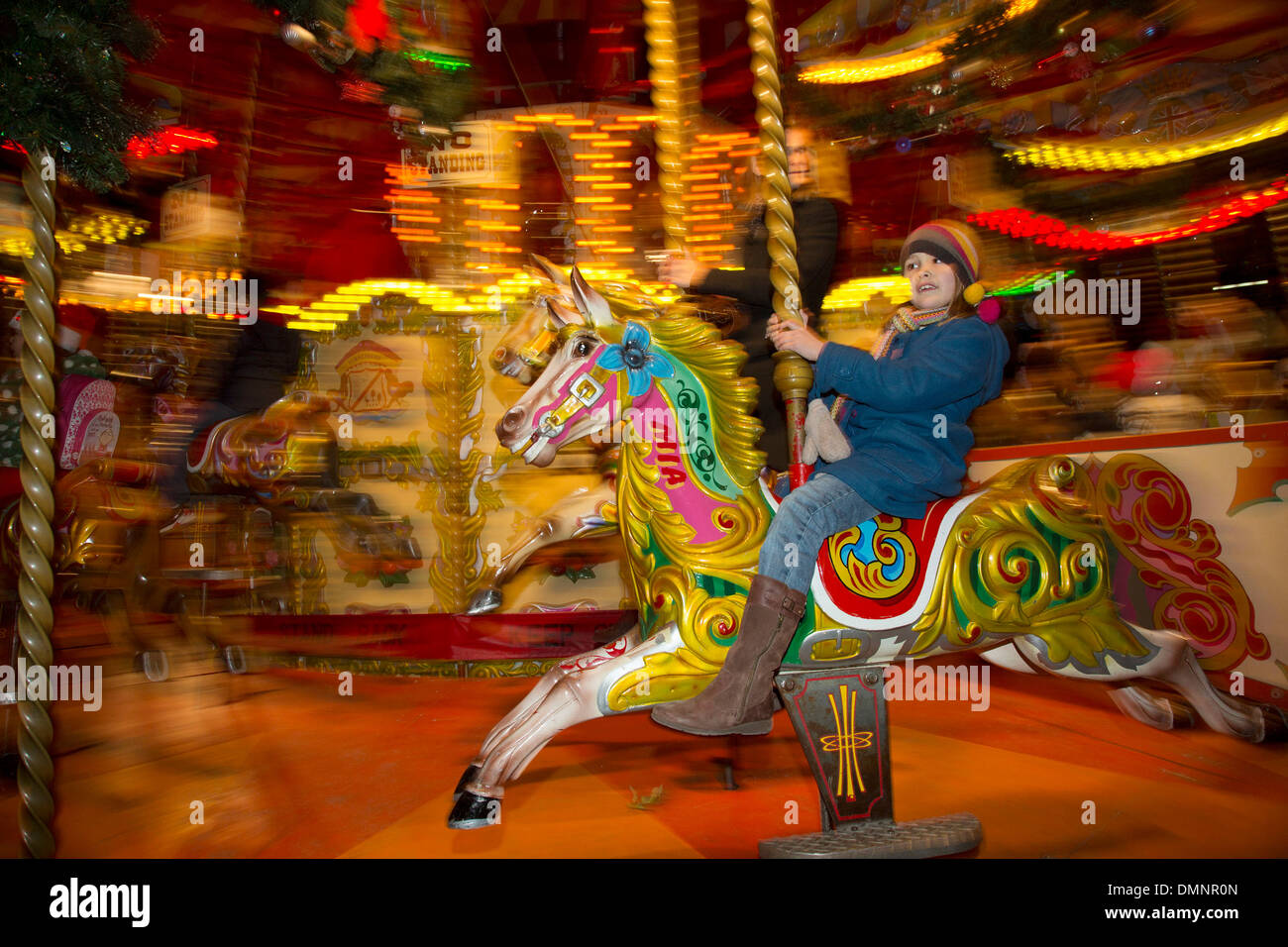 Children fairground carousel horses hi-res stock photography and images ...