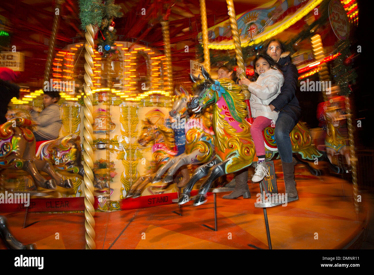 Children fairground carousel horses hi-res stock photography and images ...