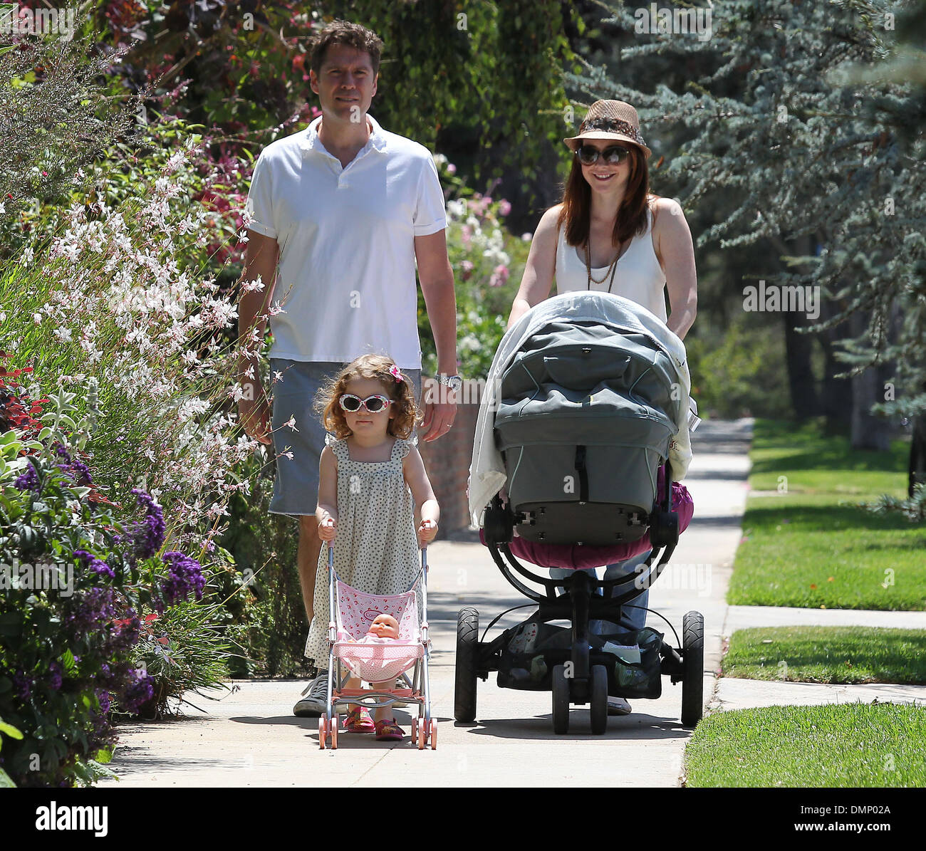 Alyson Hannigan pushing daugher Keeva in her pram walking to Brentwood ...