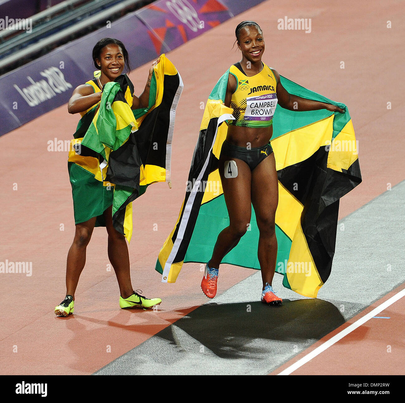Shelly Ann Fraser Pryce Of Jamaica Celebrates Winning Gold In Womens