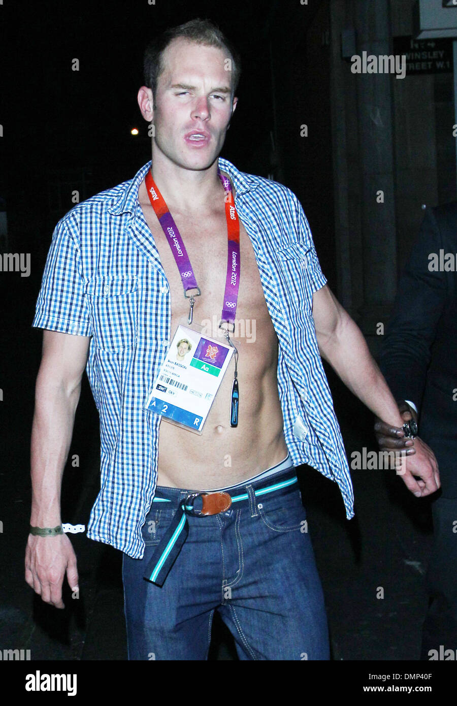 South African Olympic swimmer Jean Basson escorted out by a security ...