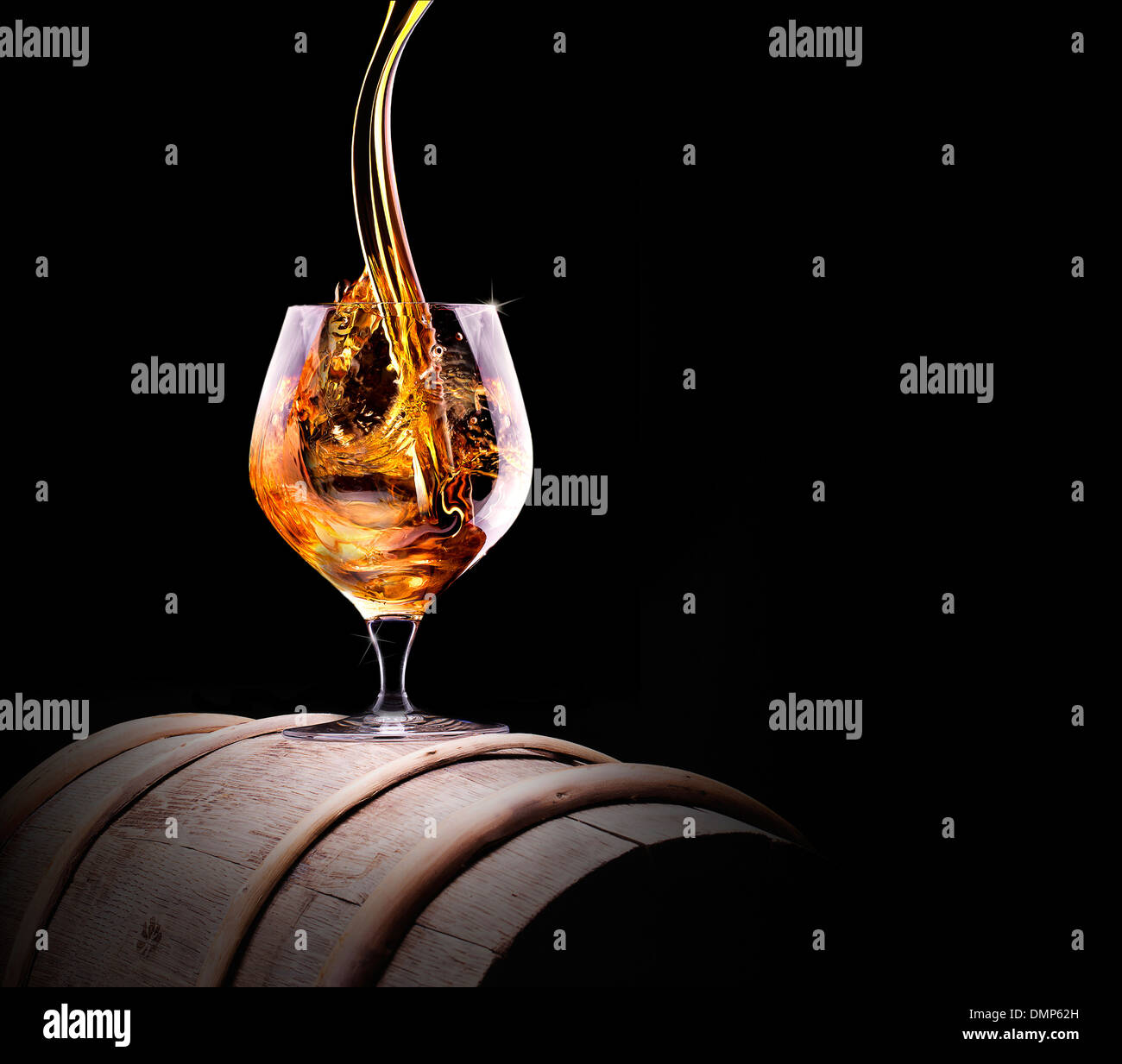 Cognac or brandy on a black background Stock Photo - Alamy