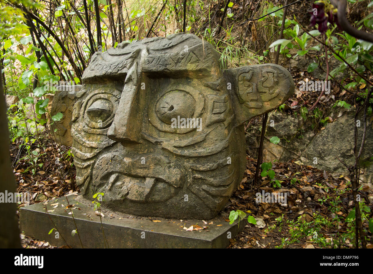Primitive head sculptures China Stock Photo - Alamy