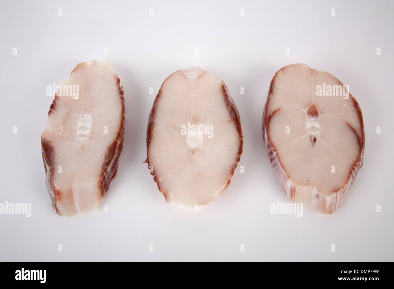 Frozen fish products laid on ice to be showcased for consumption ...