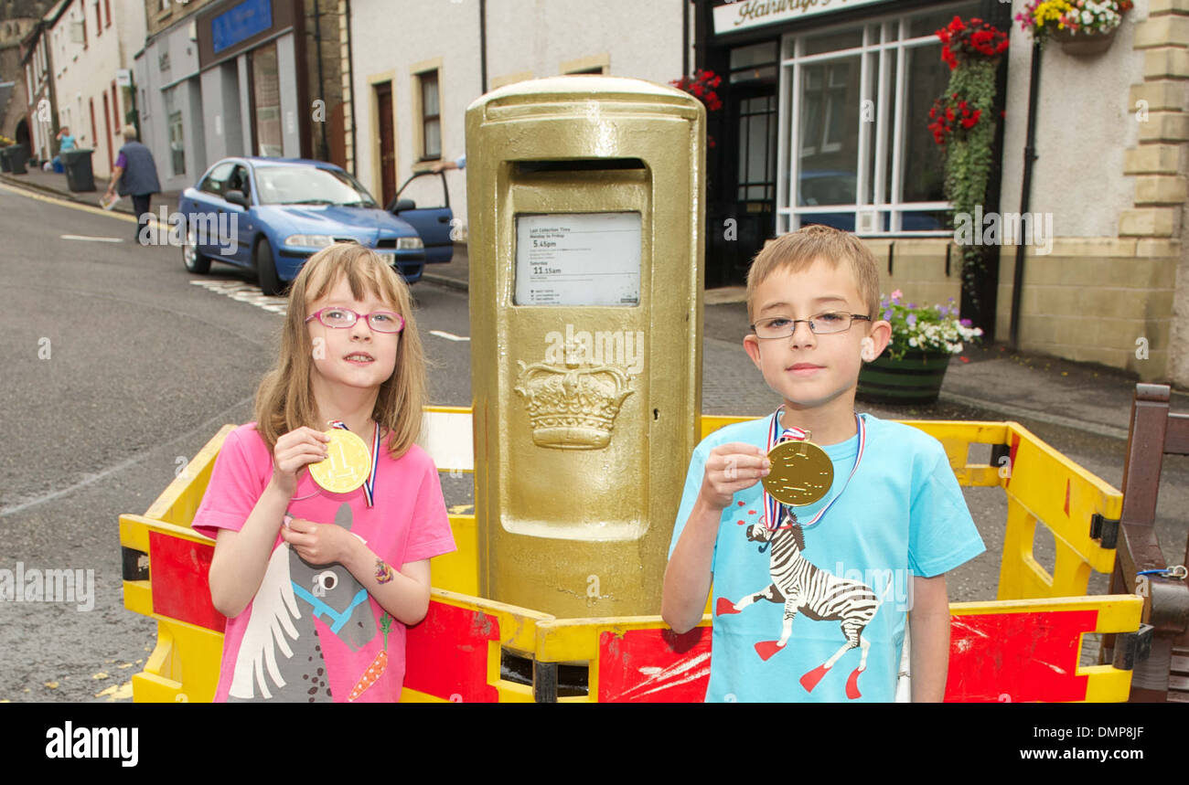 Freya Fleming and her brother Ruari of Dunblane A postbox is painted ...