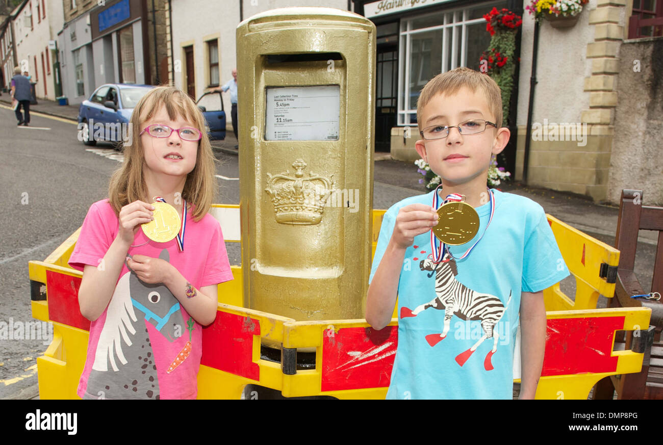 Freya Fleming and her brother Ruari of Dunblane A postbox is painted ...