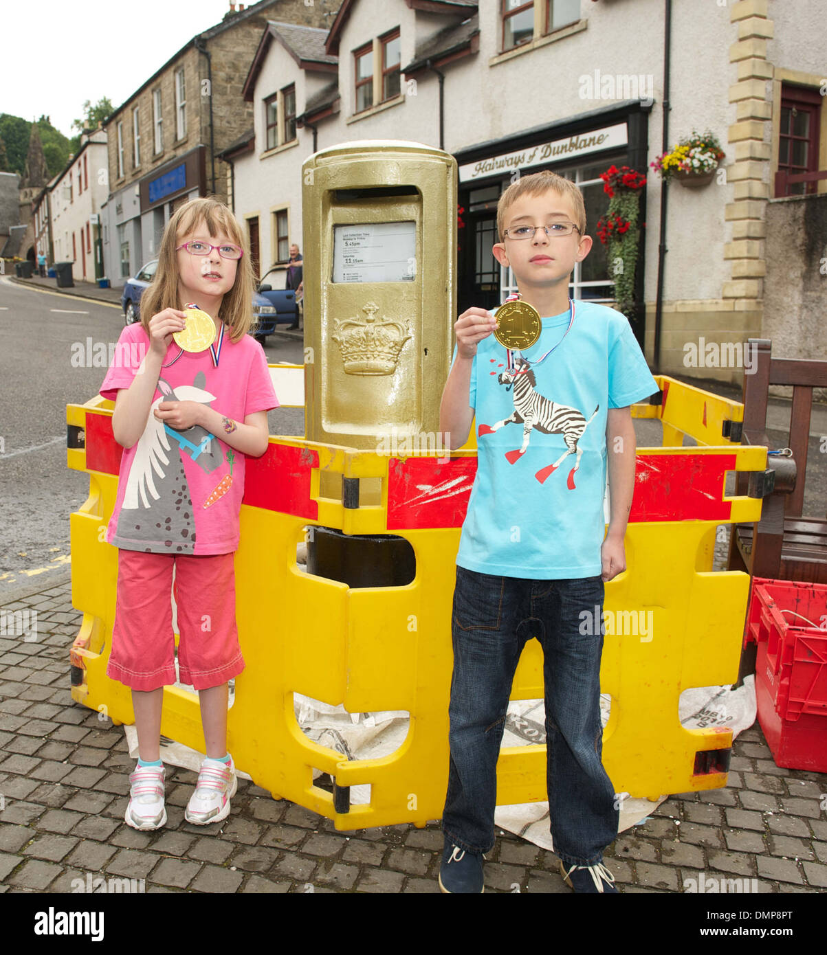 Freya Fleming and her brother Ruari of Dunblane A postbox is painted ...