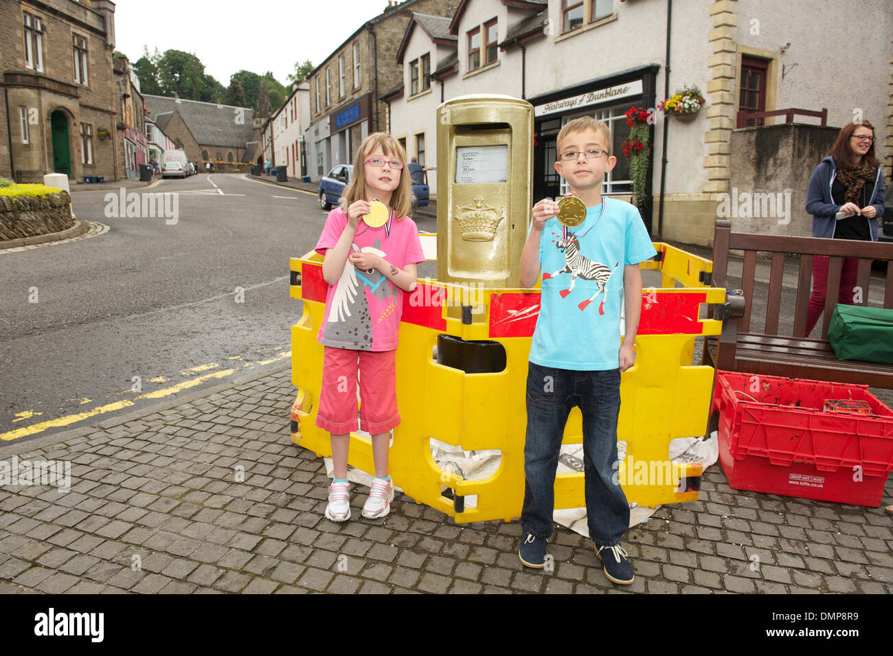 Freya Fleming and her brother Ruari of Dunblane A postbox is painted ...