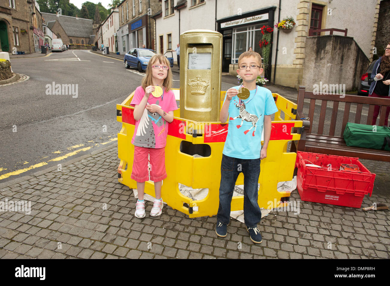 Freya Fleming and her brother Ruari of Dunblane A postbox is painted ...