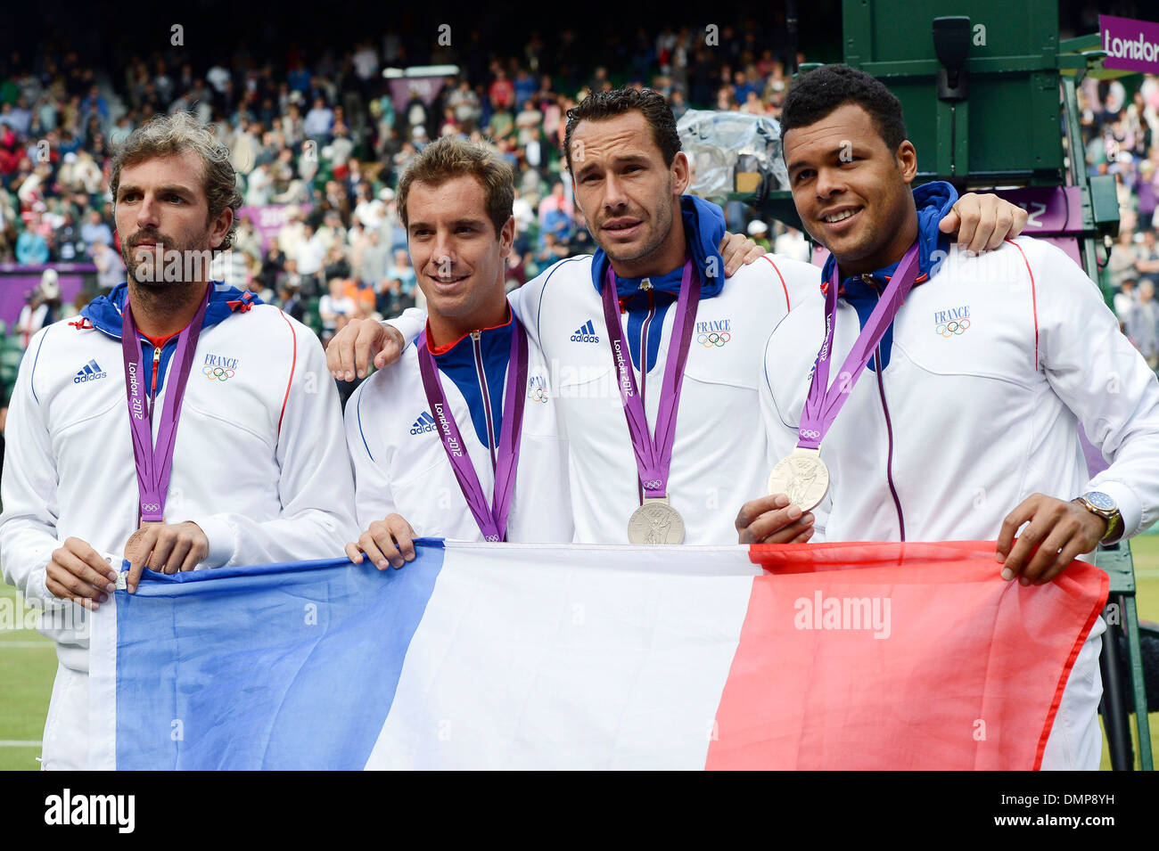 Silver medalist Michael Llodra and Jo-Wilfried Tsonga of Frances and bronze medalist Julien ...