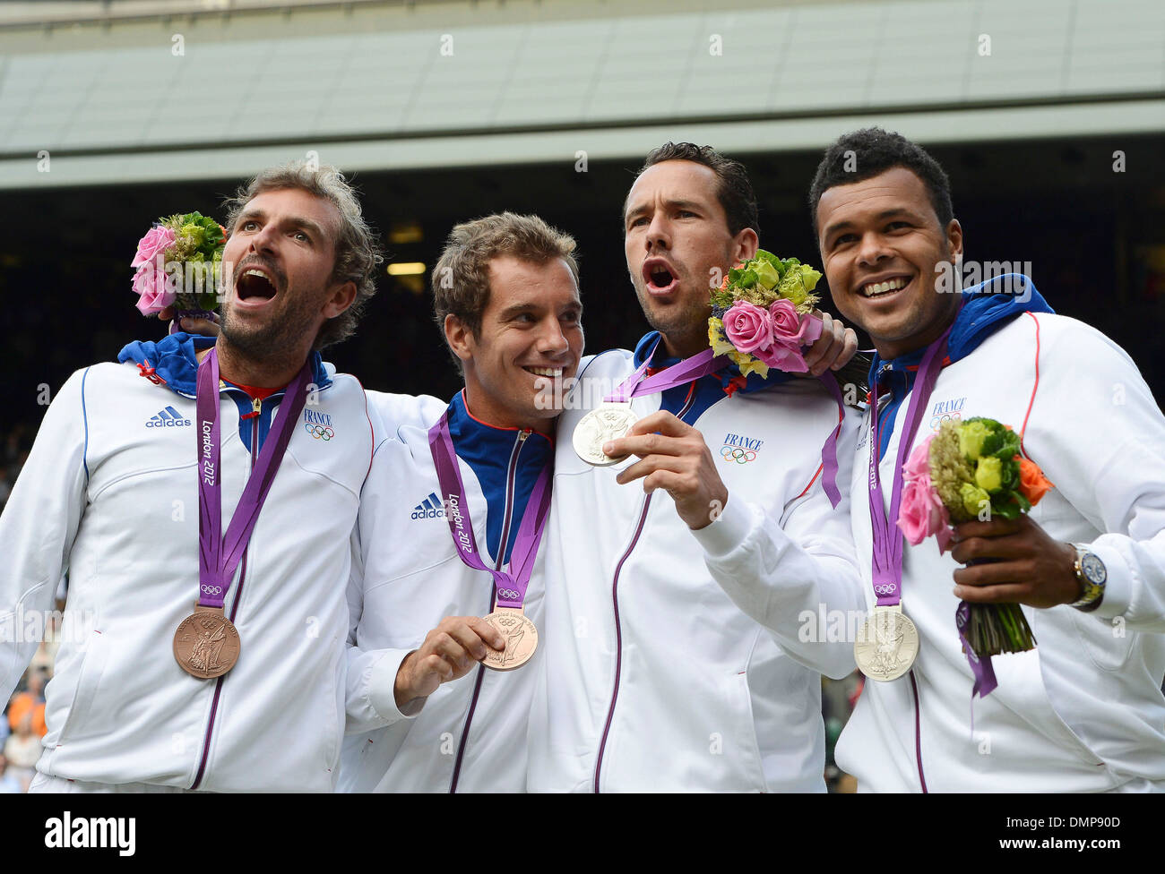 Silver medalist Michael Llodra and Jo-Wilfried Tsonga of Frances and bronze medalist Julien ...