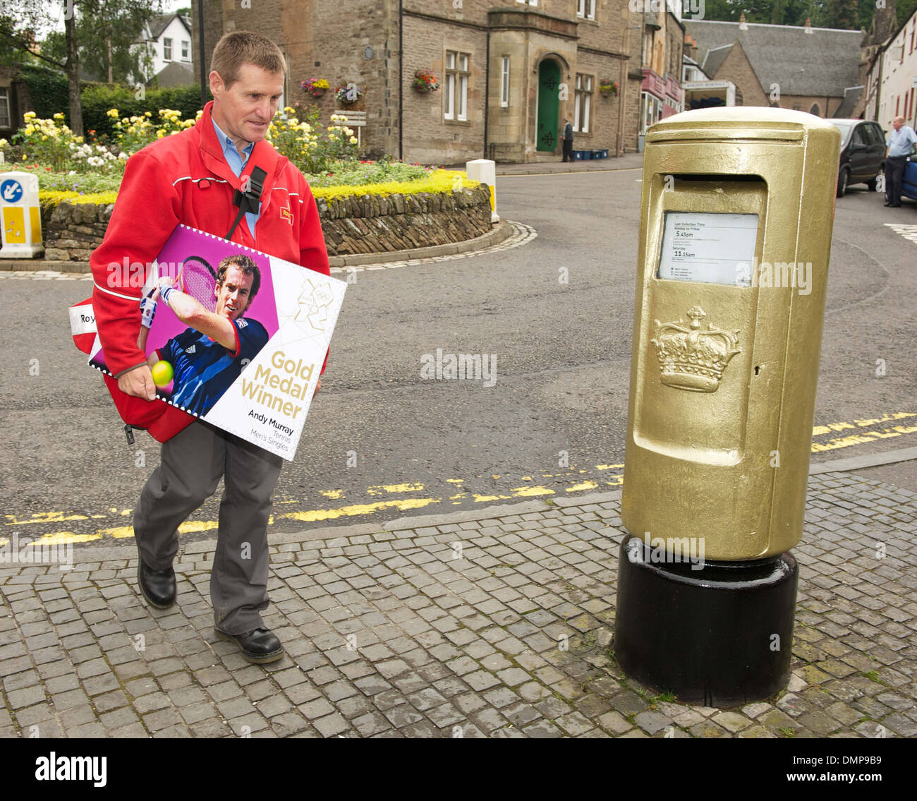 Dunblane postman John Elliot with a commemerative Andy Murray stamp at ...