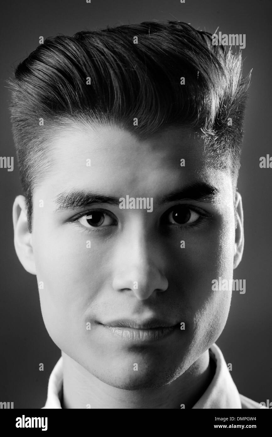 portrait of young man looking at camera Stock Photo - Alamy