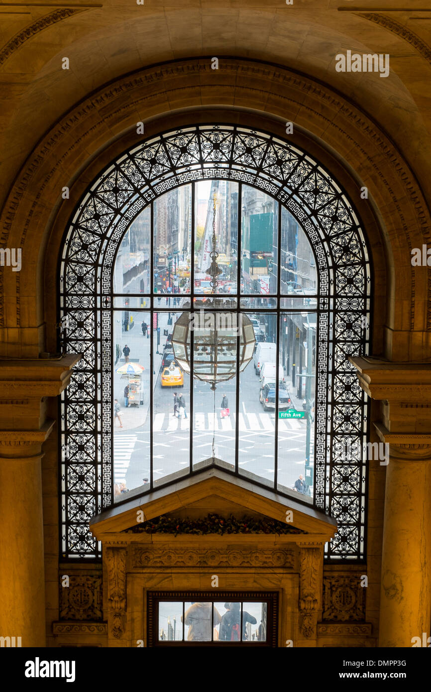 Fifth Avenue seeing from inside the New York Library front door window ...
