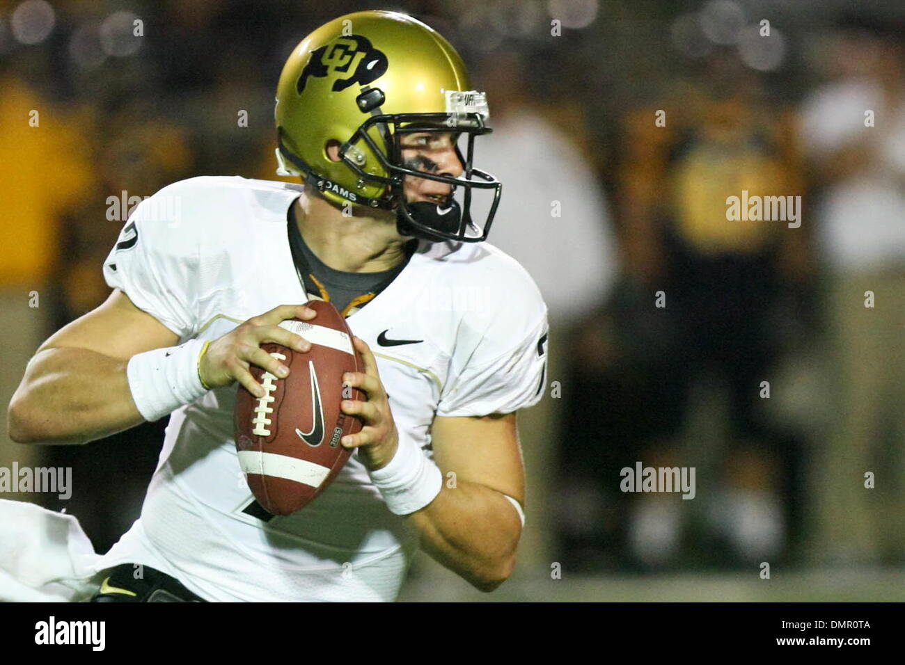 Colorado quarterback Cody Hawkins (7) looks downfield for an open ...