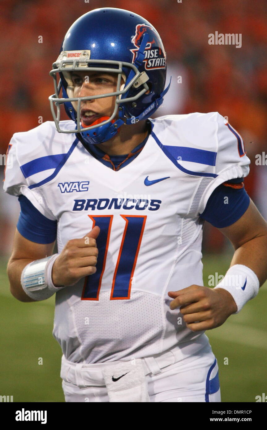 Boise State quarterback Kellen Moore (11) runs off the field during ...