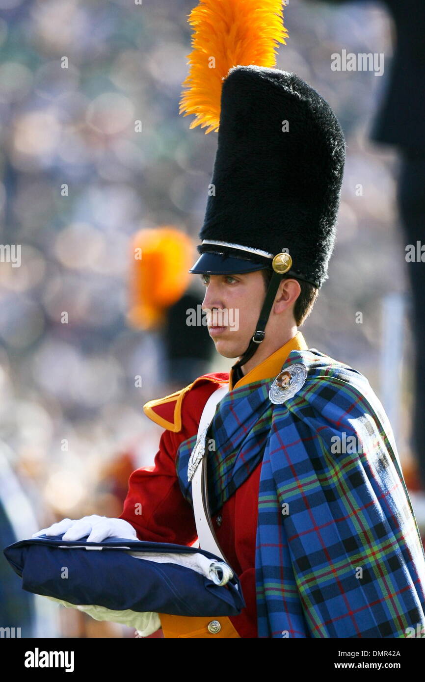 Notre Dame Irish Guard member presents the American Flag to the color ...