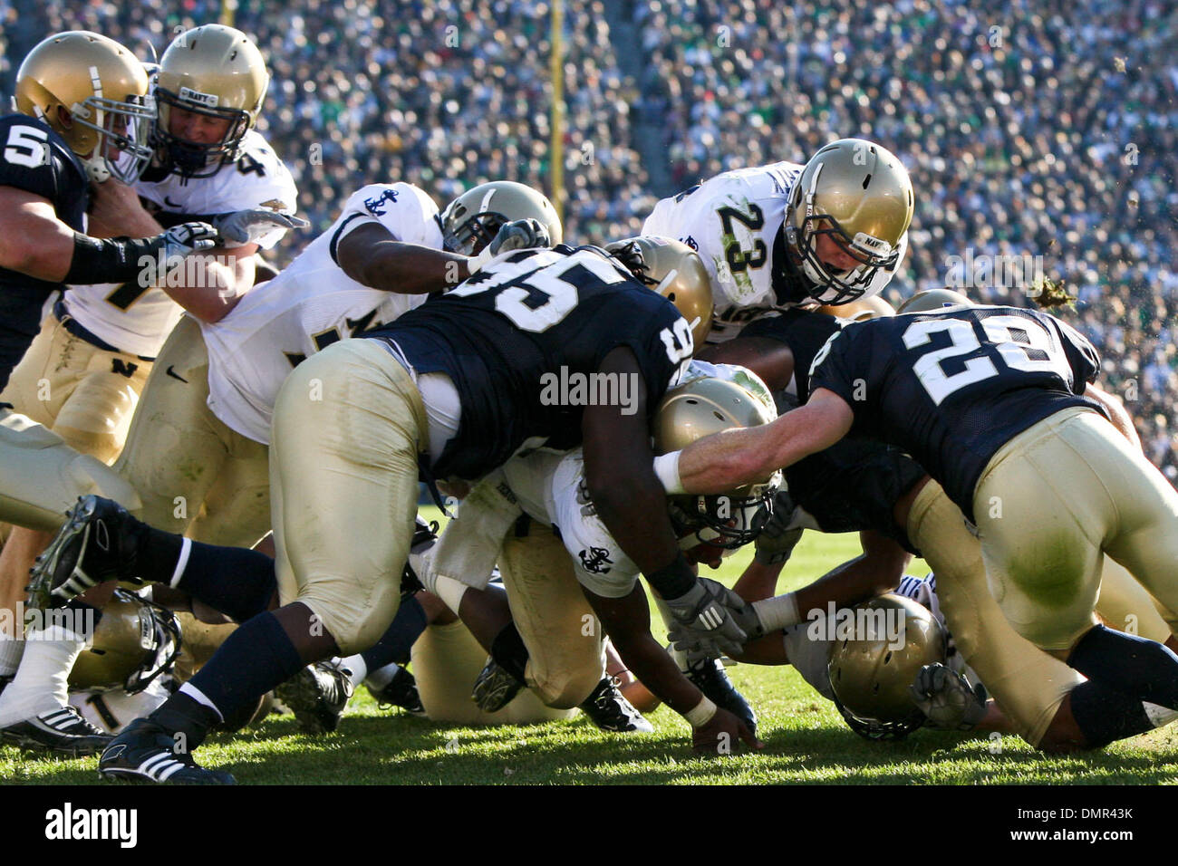 Navy quarterback Ricky Dobbs (4) tries to cross the goal line during ...