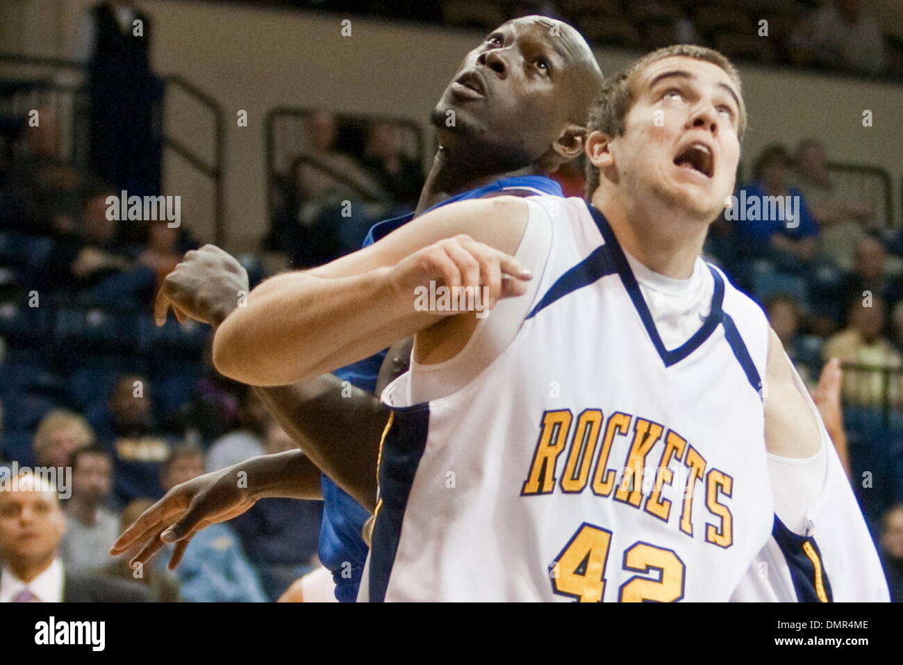 Eastern Illinois center Ousmane Crisse (45) and Toledo forward Jordan ...