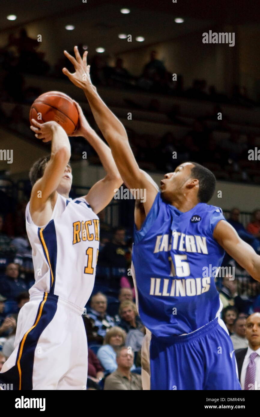 Toledo freshman guard Stephen Albrecht (15) shoots over Eastern Illinois defender James ...