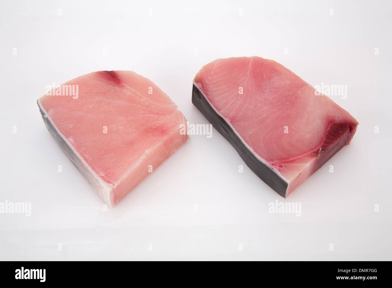 Frozen fish products laid on ice to be showcased for consumption ...