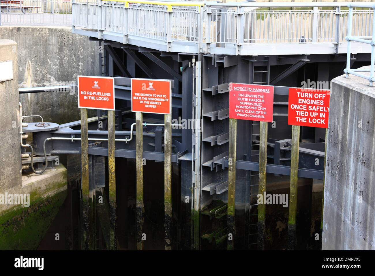 Various instruction and warning signs for boat captains on lock gates ...