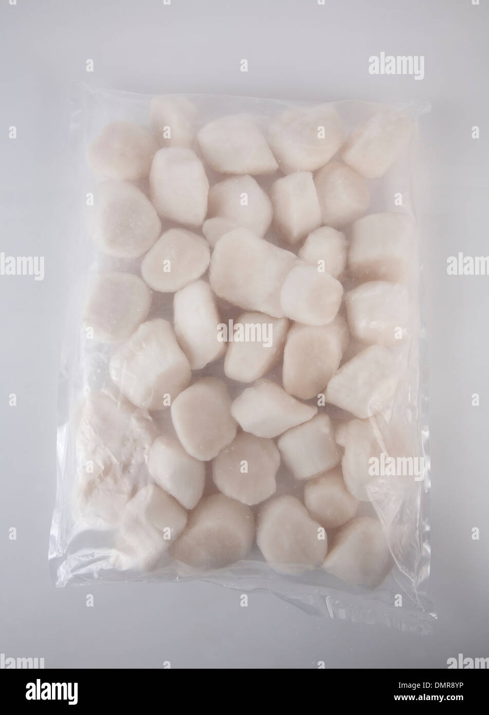 Frozen fish products laid on ice to be showcased for consumption ...