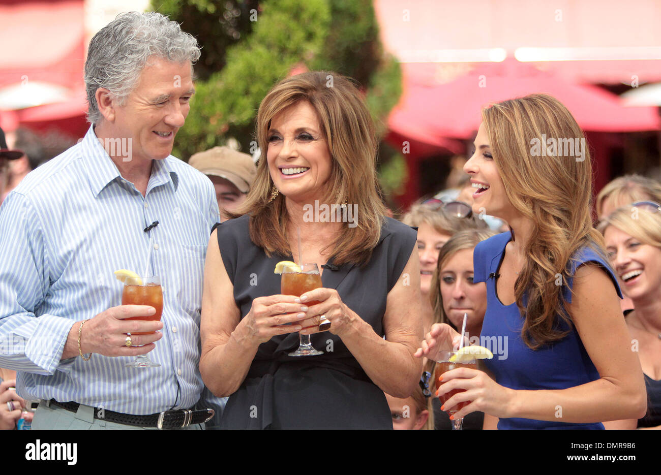 Patrick Duffy and Linda Gray with Extra host Maria Menounos at Grove to ...