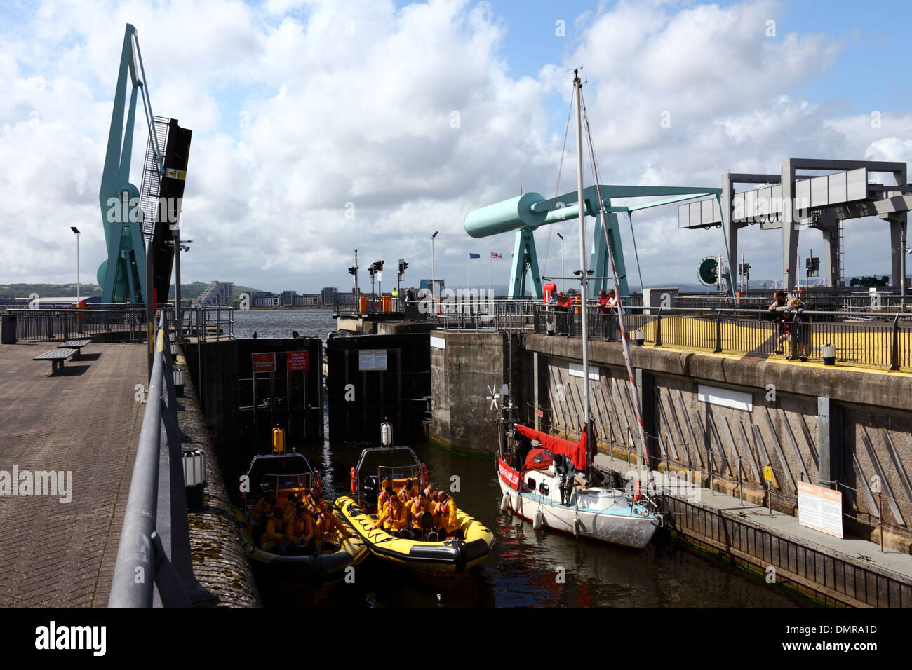 Bascule bridge open, water level going down in lock so boats can go out ...