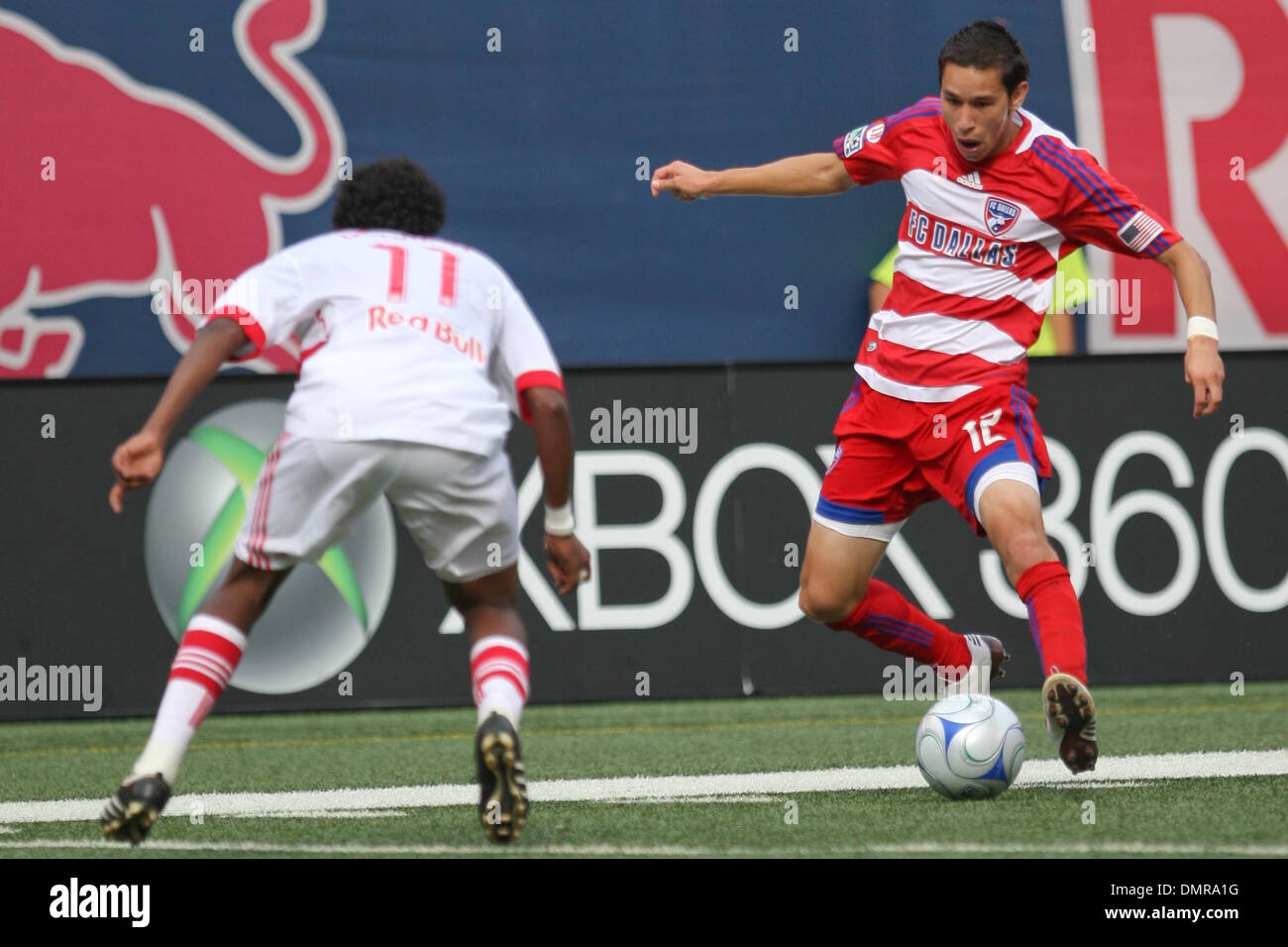 FC Dallas #12 midfielder Eric Avila out steps Red Bulls #11 defender ...