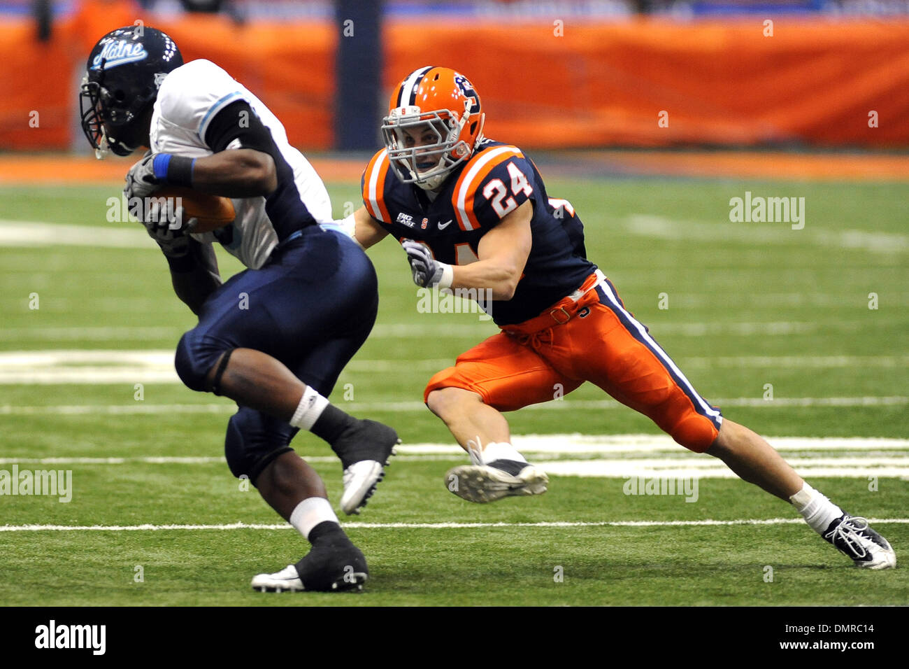 Syracuse safety Max Suter (24) lines up the hit on Maine tailback Derek ...