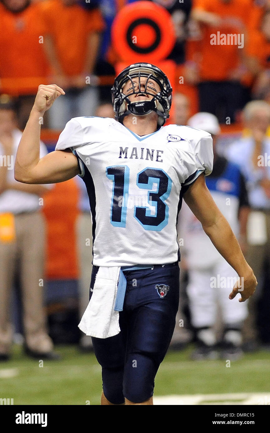 Maine quarterback Warren Smith looks up in disgust after a fourth and ...
