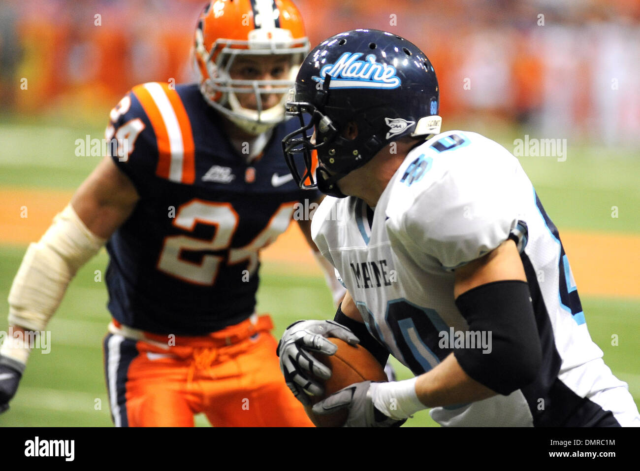 Maine tight end Derek Buttles (80) turns up field near the sideline in ...