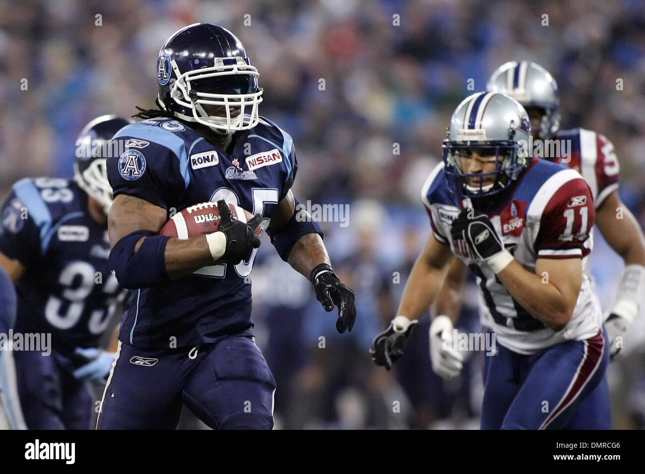 Toronto Argonauts running back Jamal Robertson scrambles up field ...