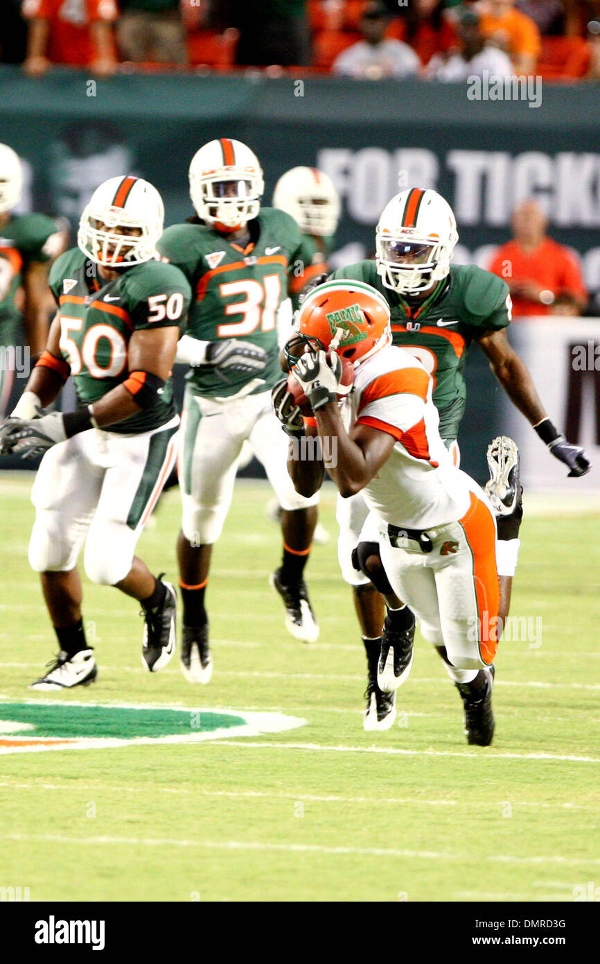 Florida A&M wide receiver Adrian Smith (4) dives to complete a catch ...