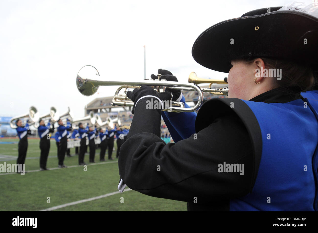 The Buffalo marching band plays as they form a tunnel for the players ...
