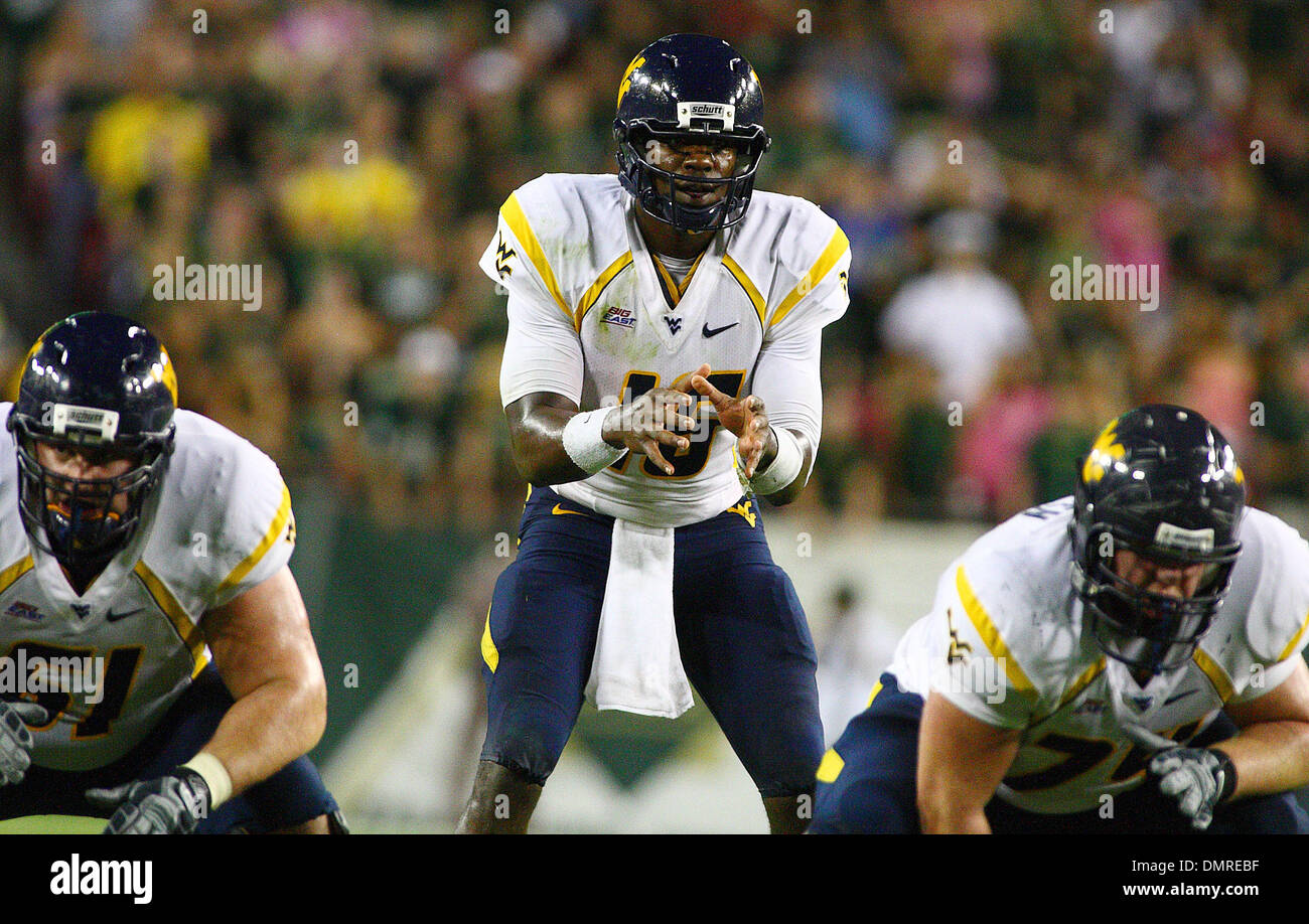 West Virginia quarterback Jarrett Brown #16 sets up for a pass during ...